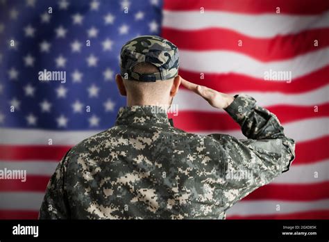 Soldier Saluting Flag