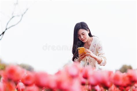 Candid Lifestyle Portrait Of Happy Young Beautiful Asian Woman Enjoying