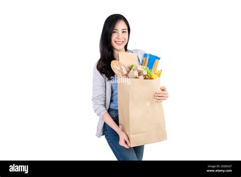 Beautiful Smiling Asian Woman Holding Paper Shopping Bag Full Of