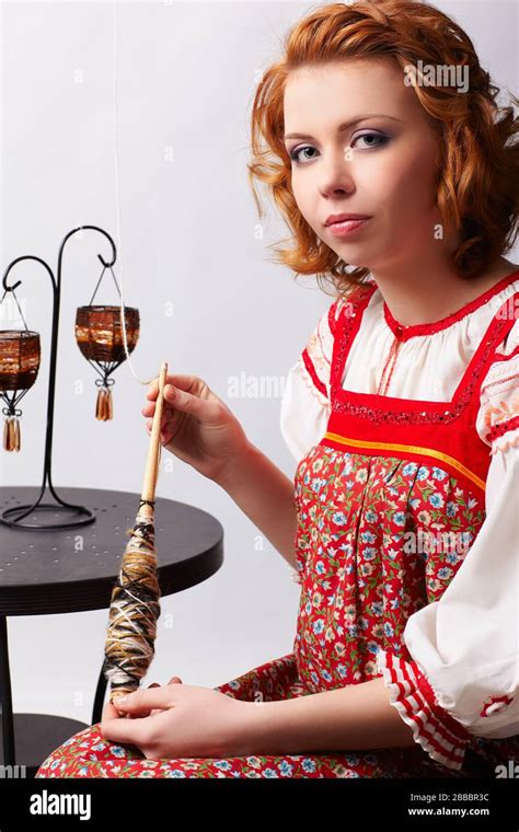 Portrait Of Beautiful Slavonic Redhead Girl In Traditional Russian Folk
