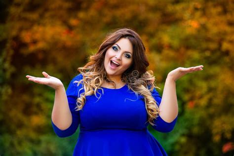 Happy Plus Size Model In Blue Dress Outdoors Fat Woman In Autumn Park