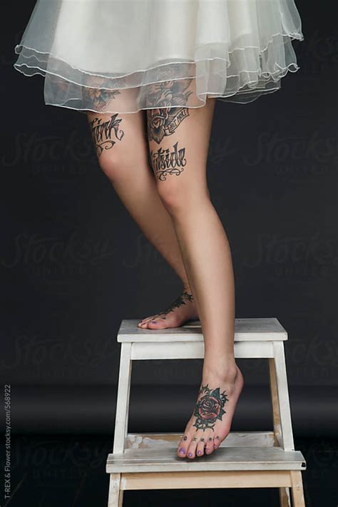 Tattoo On Legs Girls By T Rex And Flower Stocksy United
