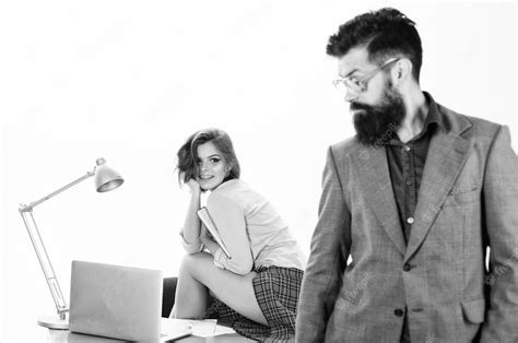 Premium Photo Man Bearded Boss Stand In Front Of Sexy Girl Working