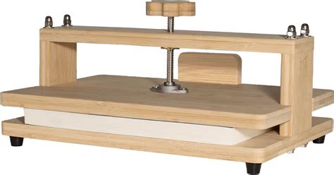 Image result for Using a Paper Press Bookbinding