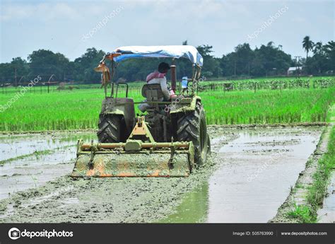 Image result for Indian Man Using Soil Compaction Machine