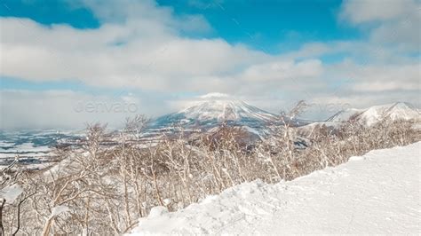 Volcano Yotei in Japan full of snow Stock Photo by phoenixproduction