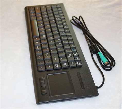 Image result for Keyboard with Mouse Built In