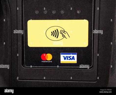 NFC card EMV contactless payment symbol on a payment terminal near ...