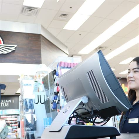 Image result for Shell Cashier Promoting Fuel Rewards