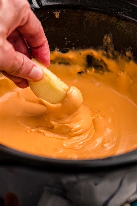 Slow Cooker Cheese Fondue - The Magical Slow Cooker