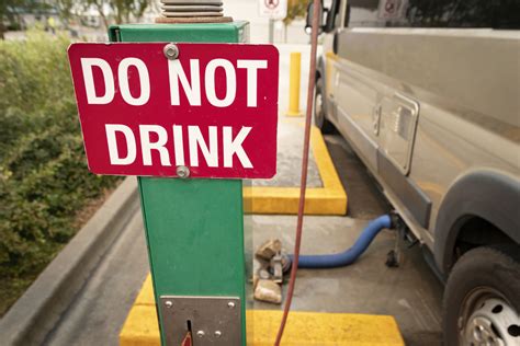 Image result for Using Portable Waste Tank for RV Dumping