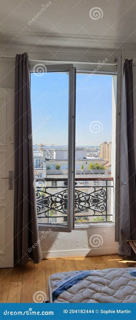 Window with view in Paris stock photo. Image of condominium - 204182444