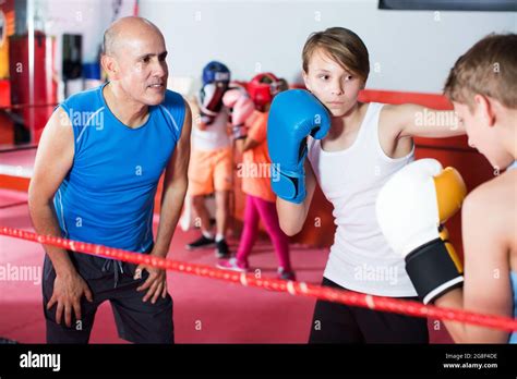 Children training on boxing ring Stock Photo - Alamy