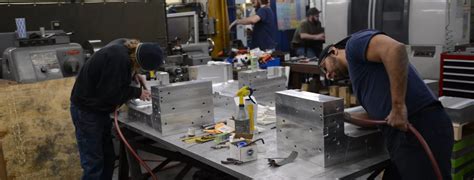 Image result for Operator Running CNC Do Machining