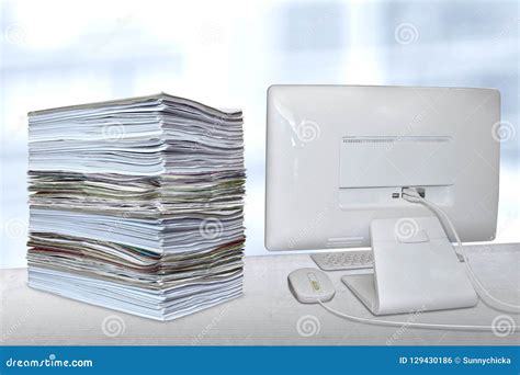 Image result for Stack of Paper by Computer