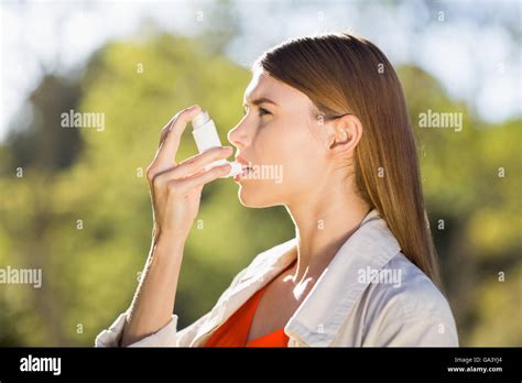 Image result for Woman Using Inhaler