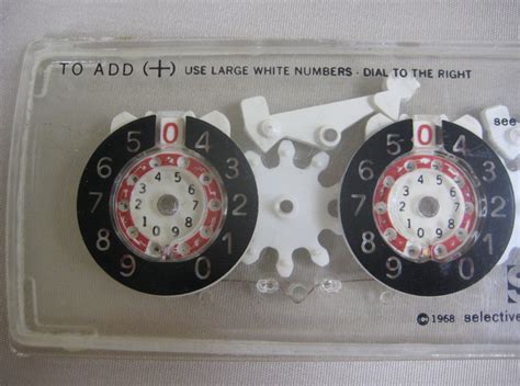 SEE adding machine - Physics Museum - The University of Queensland ...