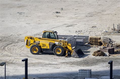 Image result for How to Drive a Backhoe Loader