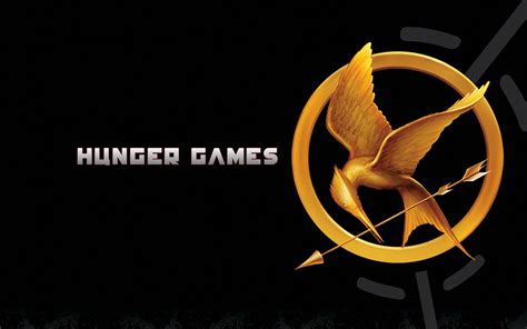 Mockingjay Pin On Fire Wallpaper