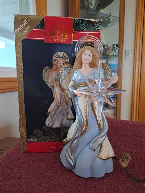 Image result for Hallmark Angel of Light Tree Topper