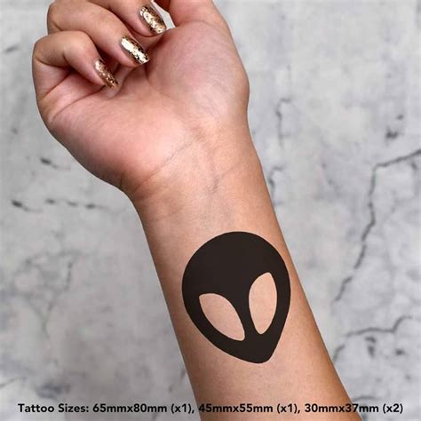 Image result for Alien Face Tattoos