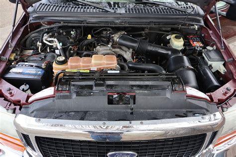 Image result for 2001 Ford Excursion Engine Compartment