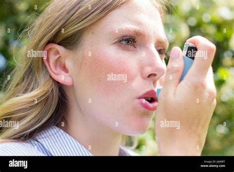 Image result for Woman Using Inhaler