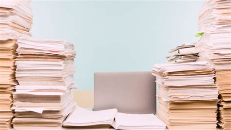 Image result for Stack of Paper by Computer