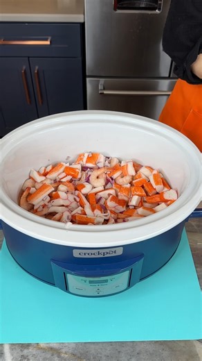 Easy seafood dinner Elaine uses shrimp, crab legs, pasta and alfredo to create a delicious seafood dinner in the crockpot. | Elaine Carol’s Kitchen