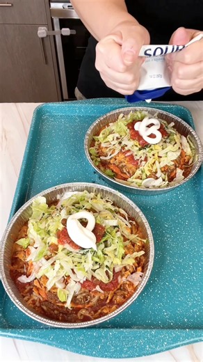 Simple and tasty! This Mexican recipe makes portable Taco Tuesday dinners perfect for movie night at home This original video was produced by Network Media LLC, Kells Kitchen, and Kelly N. | Family Style Cooking