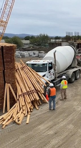 31K views · 23 reactions | A cement truck rolled onto the site with its brakes clearly not doing their job, and you can see everyone realize it at the same time. Instead of plowing straight through the crew, it buries itself into a tall stack of lumber that was never meant to be a safety feature but ends up soaking up the impact like a giant wooden crash pad. | Art Plus | Facebook
