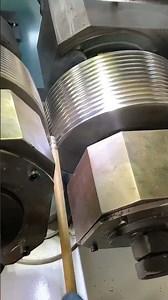 the stage of making a thread on iron using sophisticated tools in a factory