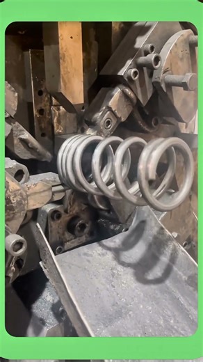 “Coil Spring Making for Precise and Durable Performance #MetalWork #SpringMaking #DIYProject”
