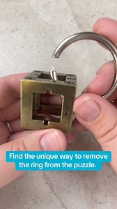 Find the unique way to remove the ring from the box. #puzzlesolving #puzzlemaster #puzzle #puzzles | Puzzle Master Inc.