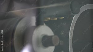 Drug tablets are rolled on cylinder machine for plastic packaging, static