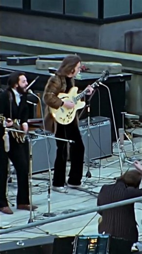 The Beatles sing their exciting song Get Back