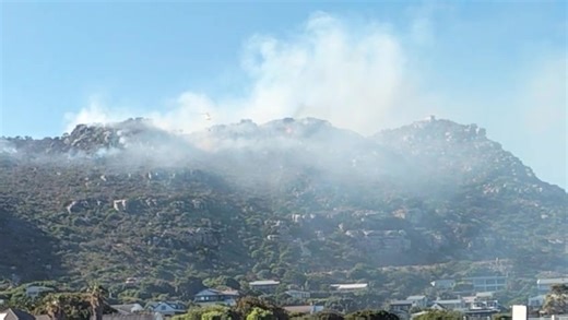 🔥 Ocean View Fire Update 🔥 SANParks Table Mountain National Park Fire Management teams, together with NCC Wildfires, Volunteer Wildfire Services, and the City of Cape Town Fire & Rescue Services, are on scene combating a vegetation fire in Ocean View that broke out this morning at approximately 04:30. The first helicopter to arrive ahead of the fire season has already made its first water drop at the Ocean View fire line, supporting firefighters working on the ground. We urge the public to avo