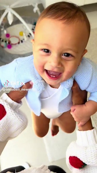 Adorable Baby Spinning Challenge with Smiling Fun