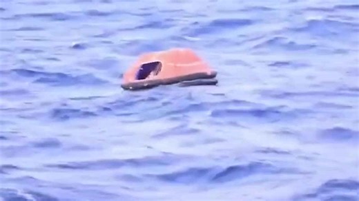 China Coast Guard pulls Filipino sailors from sea as cargo ship capsize leaving two dead