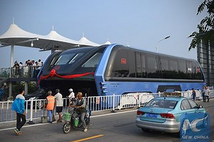 China Builds Real-Life Version of Straddling Bus That Drives Over Cars in Traffic