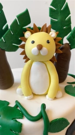 Welcome to the Jungle! ✨ 3D fondant animals and trees took over this birthday party, we loved seeing it come to life. 女   #junglecake #tigercake #monkeycake #customcake #pnwbakery #tacomabakery #celebritycakestudio #puyallupbakery | Celebrity Cake Studio | Facebook