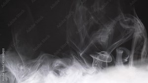 Texture of cigarette white smoke on a black background. Slow motion. Vape smoke.