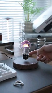 Experience the magic of modern technology with this mesmerizing levitating bulb! Suspended mid-air, it never touches the base, creating an enchanting floating effect. Perfect as a conversation piece or a unique decor element, this incredible display of innovation brings light and wonder into any room. | Asian Technology
