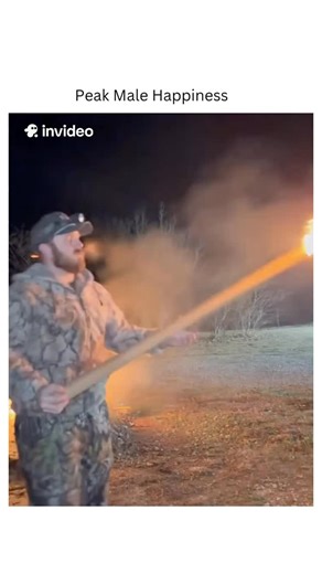 Being Guys on Instagram: "A short nighttime clip showing a controlled fire interaction in an outdoor setting. The Subject An individual stands outdoors holding a long wooden pole with a flame at one end, positioned near an open ground fire. The Mechanism Combustion occurs as heat ignites gases released from the burning material. Airflow and gravity influence flame shape, while the pole acts as a simple handle to control distance and direction. The Purpose To document a visually striking example 