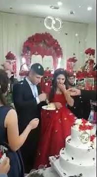 Angry groom loses it during wedding cake cutting ceremony, leaving guests and bride horrified
