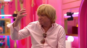 Celebrity Big Brother star Michael Fabricant reluctantly addresses why he wears a blonde wig as he admits 'I don't like to talk about it'