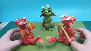 Dragons in polymer clay. #fantasyart #polymerclay #curiousmondo #dragons | Curious Mondo | Facebook