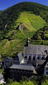 Mosel is Home to the world's steepest vineyards, the Mosel Valley has a history of winemaking that dates back to the Romans in the second century. Thisregion was originally named the Mosel-Saar-Ruwer, after the main river and its two tributaries. The name has now been shortened to Mosel for simplicity, though it can still be viewed as three subregions. #travelblogger #vineyard #mosel #winery #travel #bernkastel | The amazing places