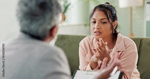 Woman, notes and client at counseling session for psychotherapy or develop coping skills for emotions. Mature female therapist, communication and empathy for healing, mental health and advice.