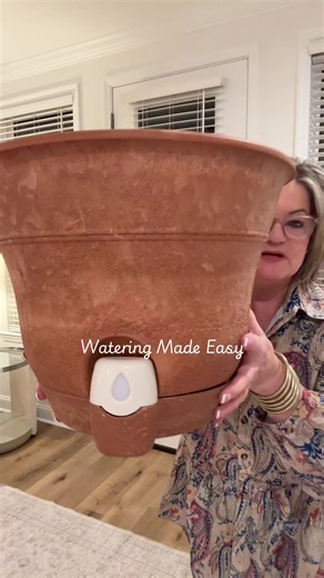 These self-watering planters keep plants hydrated longer with less effort. Beautiful stone-look finish, perfect for porches, patios, or entryways. Great size for flowers, greenery, or faux plants. #selfwateringplanter #outdoorplanters #porchdecor #patiodecor #gardenfinds